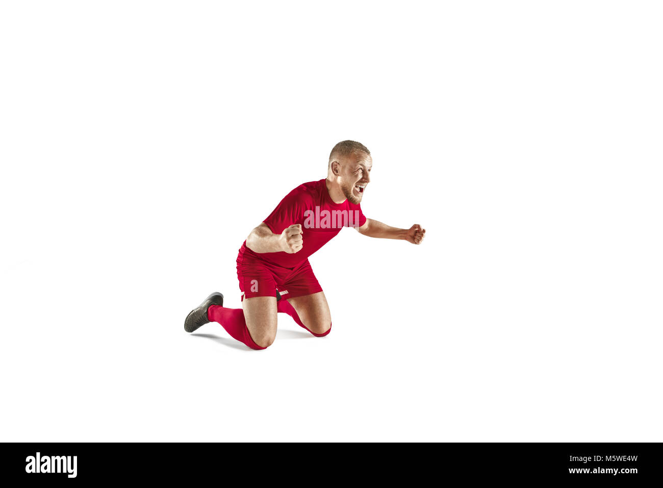 Happiness football player after goal Stock Photo - Alamy