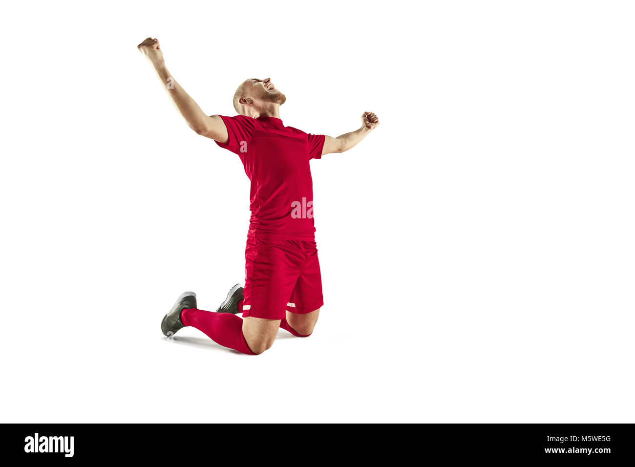 Happiness football player after goal Stock Photo - Alamy