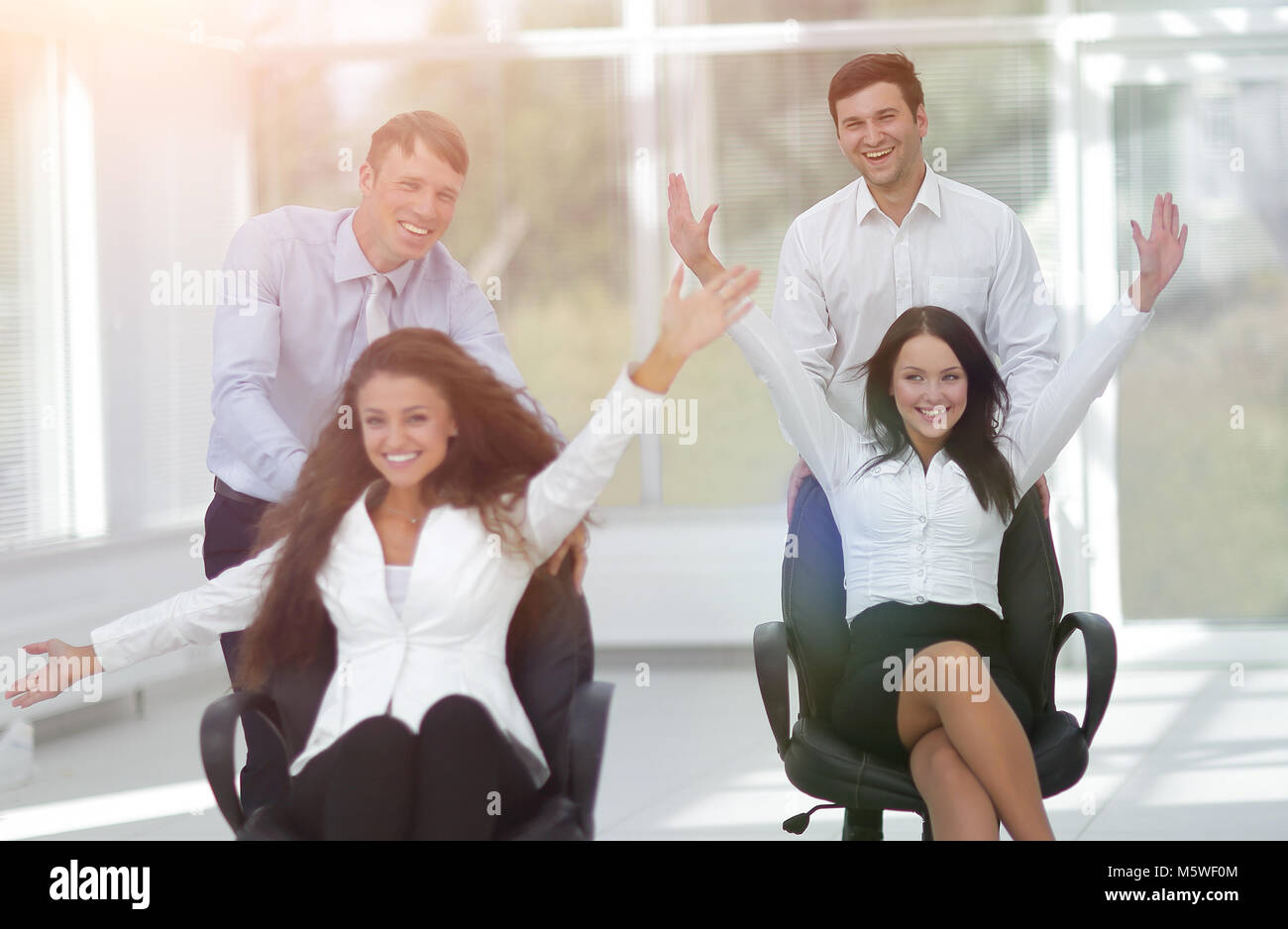 enthusiastic business team in office Stock Photo - Alamy