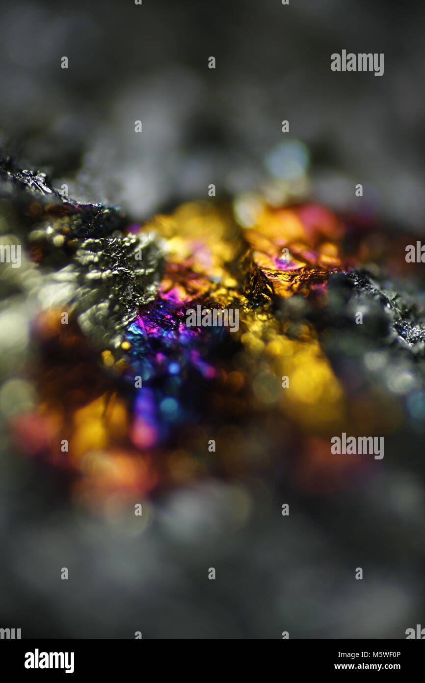 This is iridescent colorful copper ore called peacock ore or ...