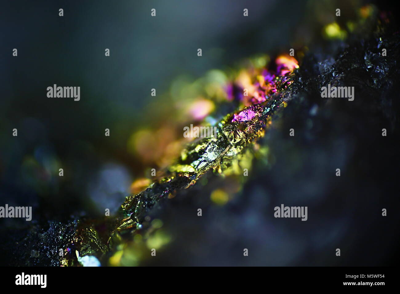 This is iridescent colorful copper ore called peacock ore or ...