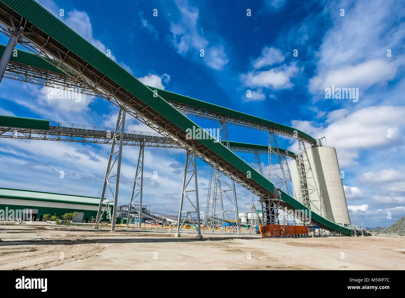 Platinum Mining and Processing of ore, Piles of ore rock being moved ...