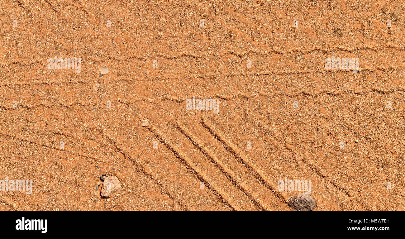 in the desert beach track of car and truck in the sand like abstract ...