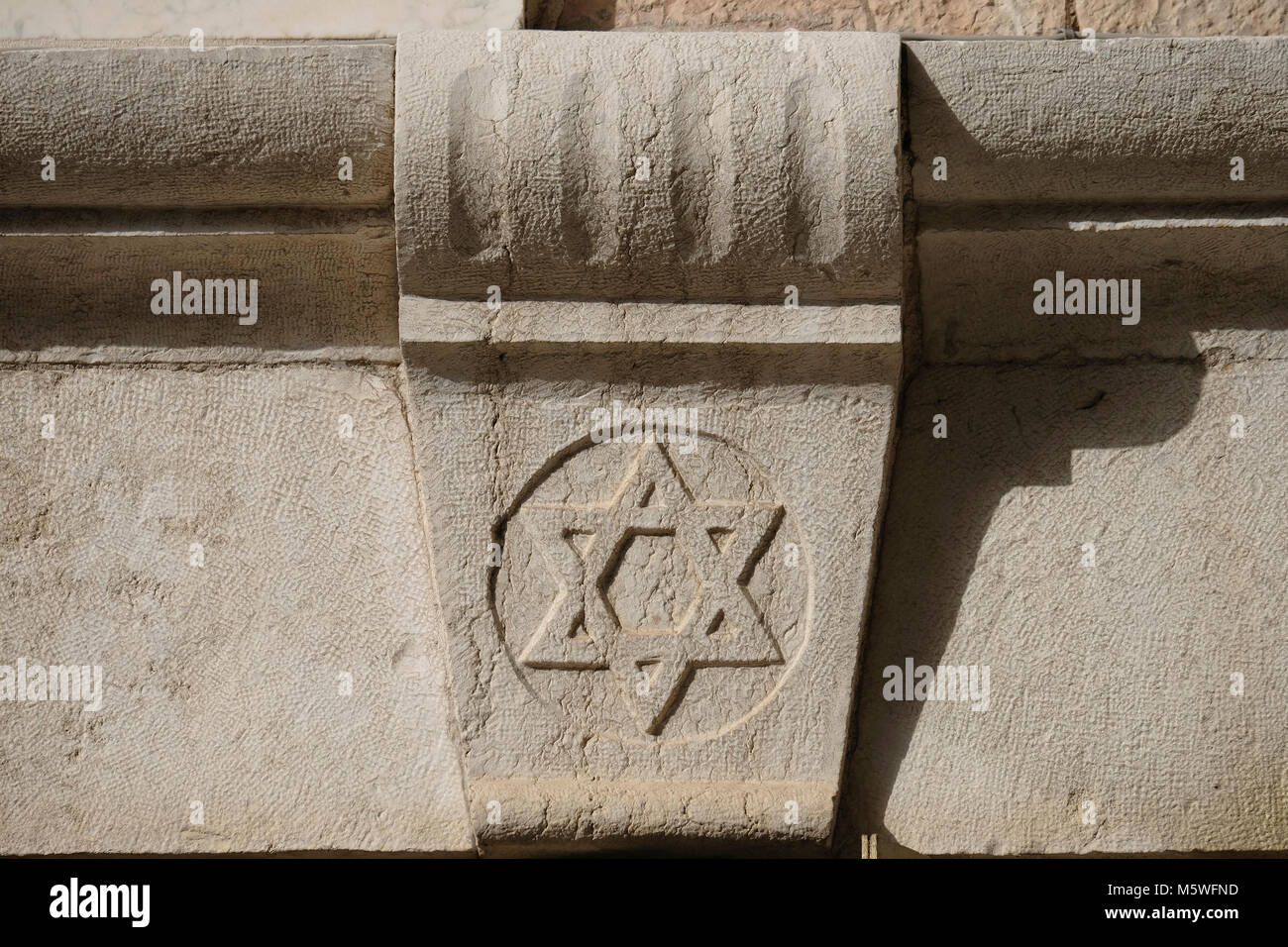 A Jewish Star of David relief engraved on the facade of a house in the ...