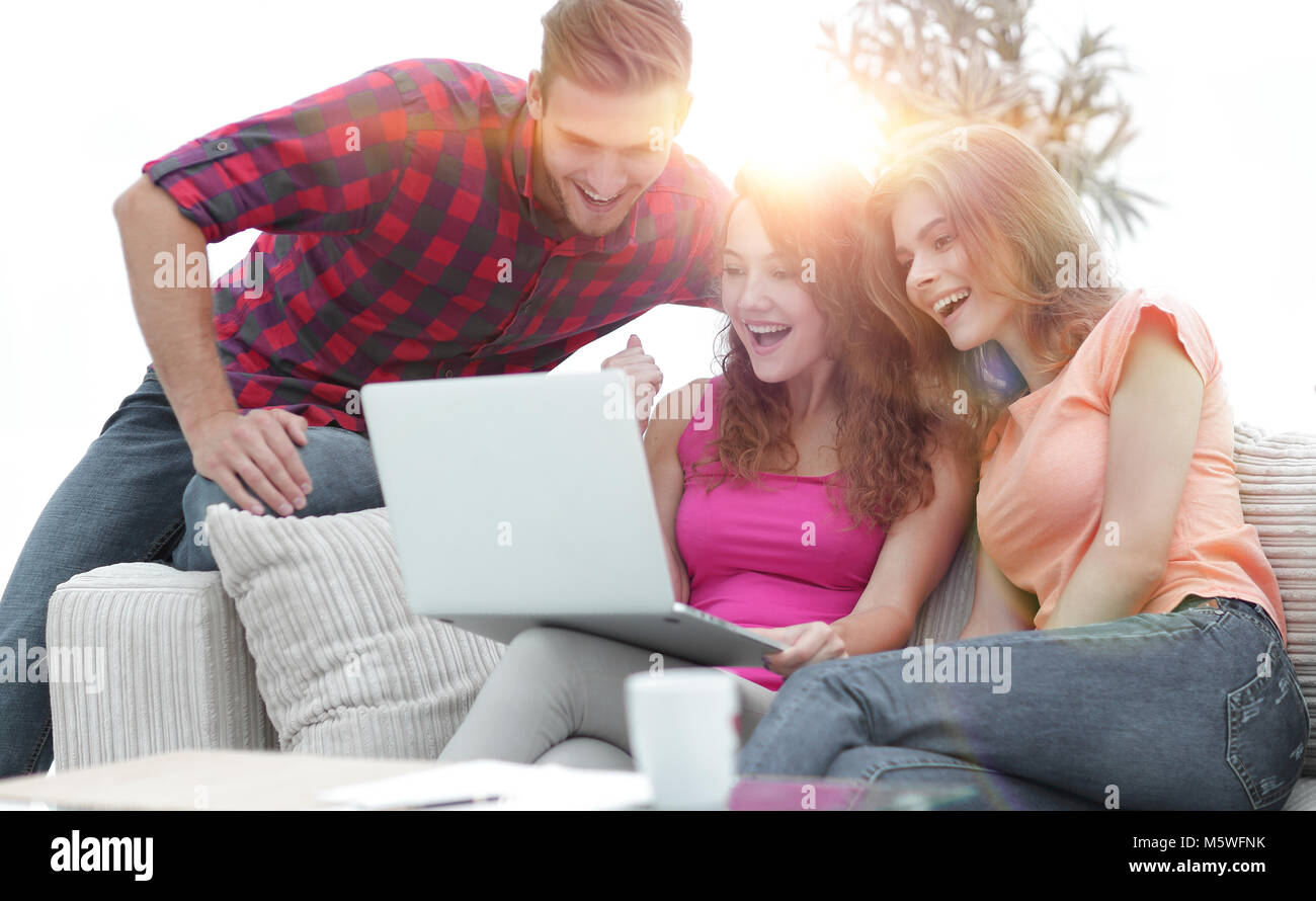 students people browsing through your favorite video on the lapt Stock ...