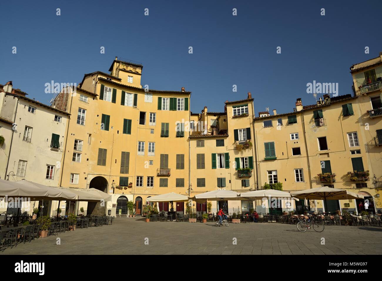 LUCCA, ITALY - APRIL 2017 - Piazza dell'Anfiteatro in Lucca s the most ...