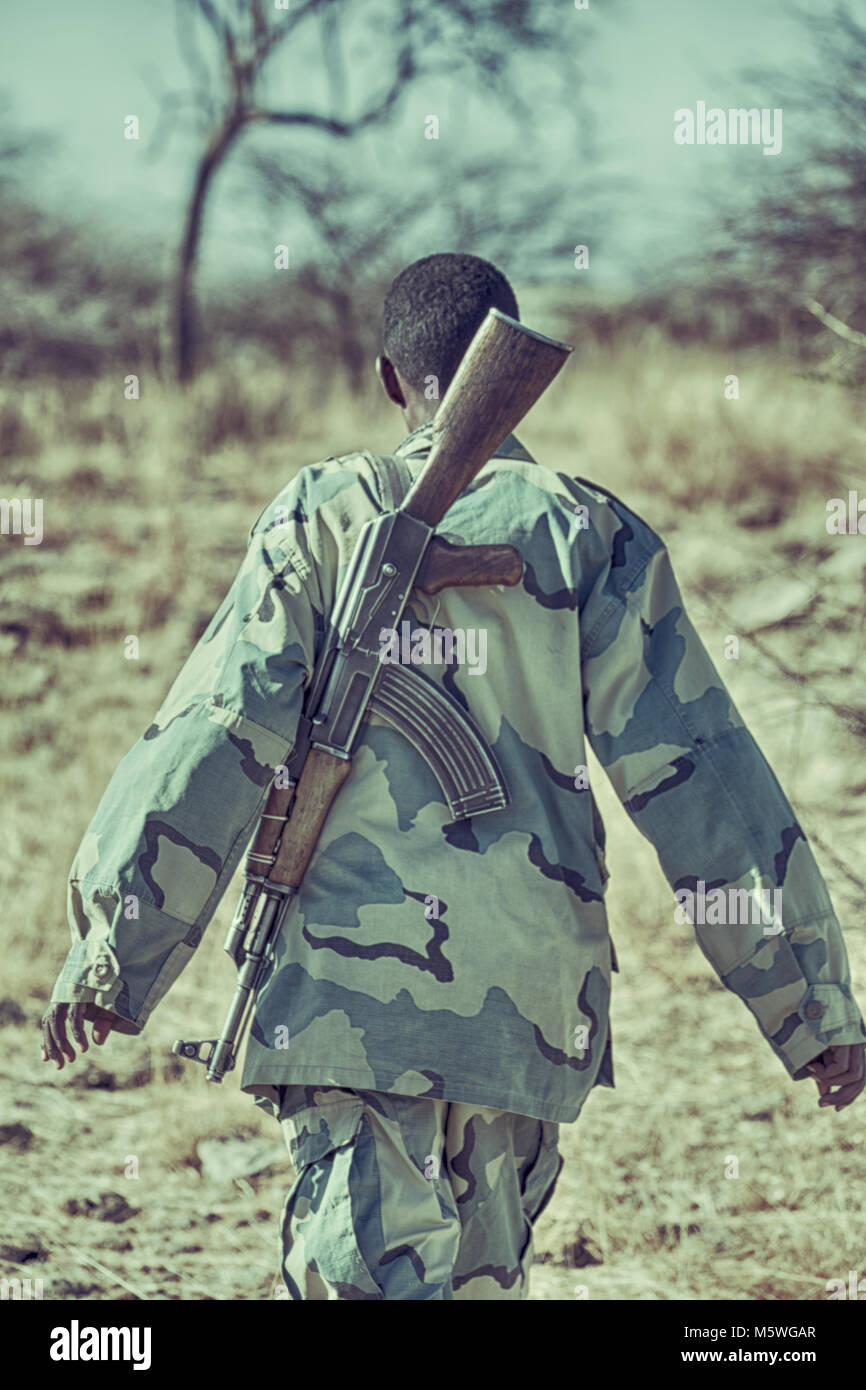 africa in the land of ethiopia a black soldier and his gun looking the ...