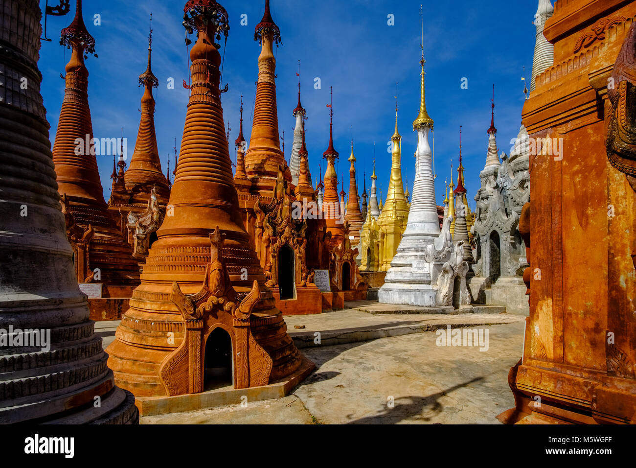The partly restored monuments of Shwe Indein Pagoda are located on a ...