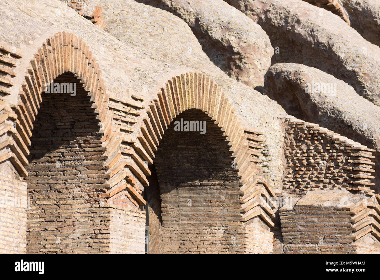 Interior walls and arches of the Colosseum or Coliseum, also known as ...