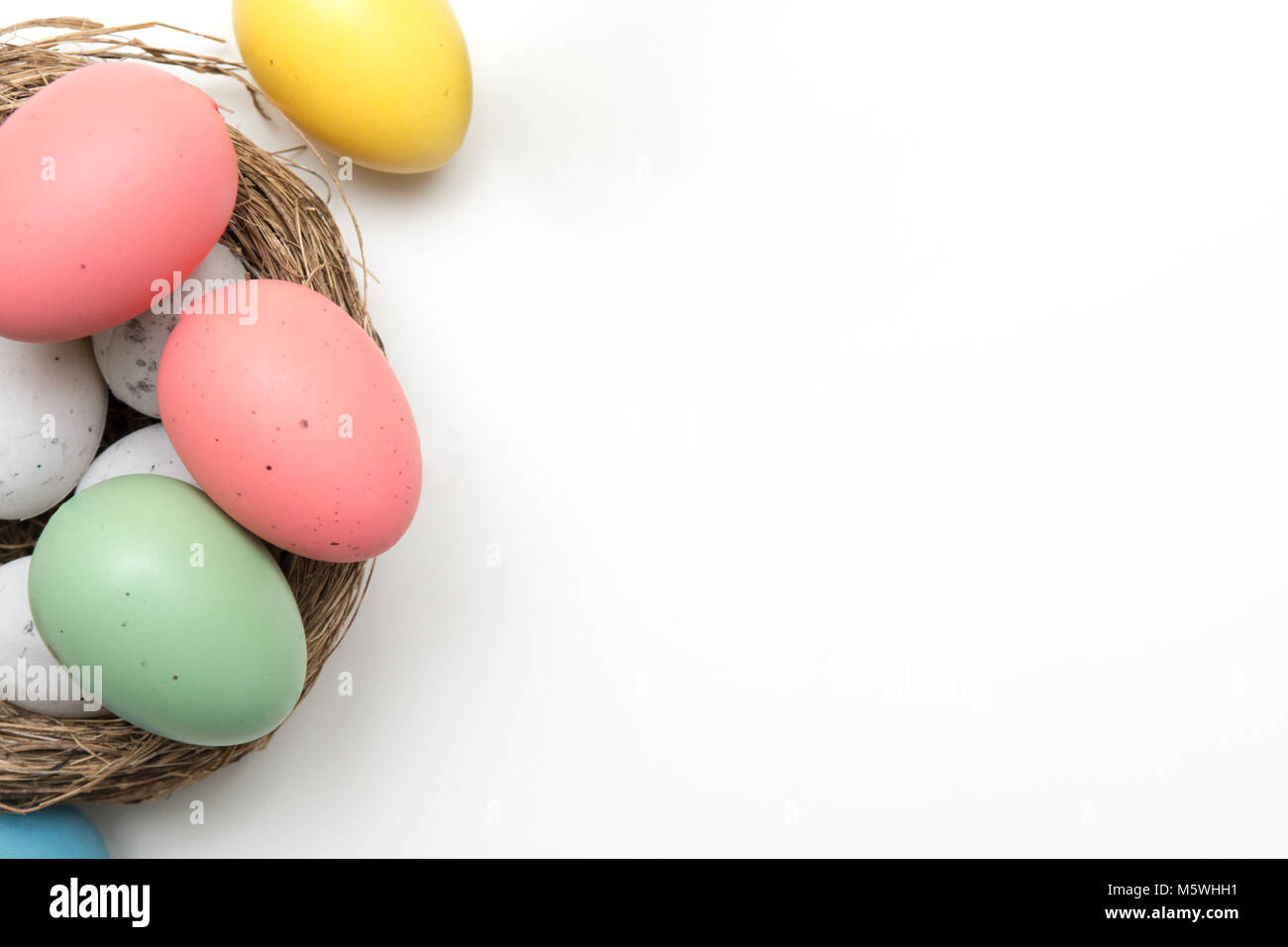 Easter egg layout design with coloured eggs and white copy space Stock ...