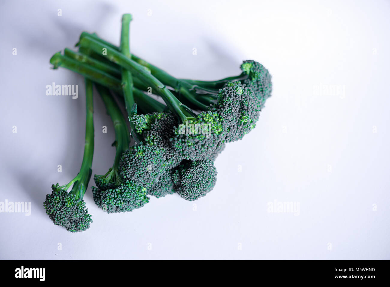 cut broccoli mess pattern on white background Stock Photo - Alamy