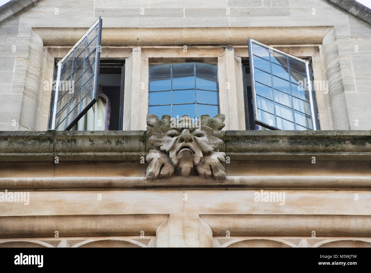 Carved stone gargoyles / grotesques on an oxford university building ...