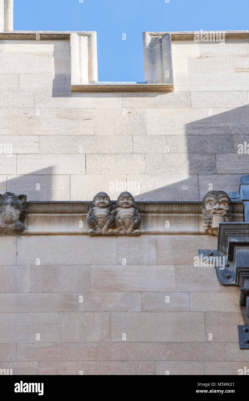 Carved stone Tweedledum and Tweedledee gargoyle / grotesques on the ...