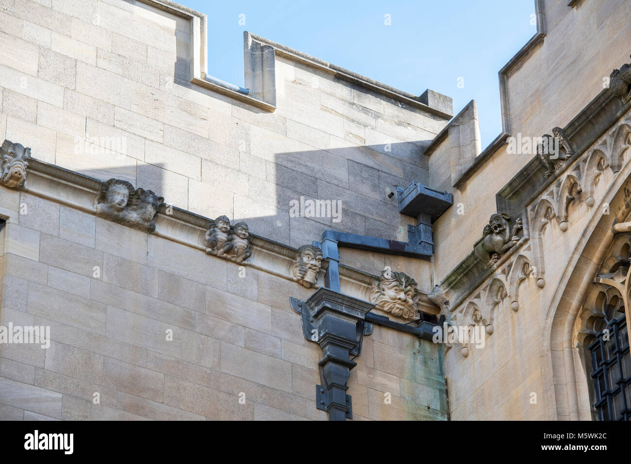 Carved stone Tweedledum and Tweedledee gargoyle / grotesques on the ...