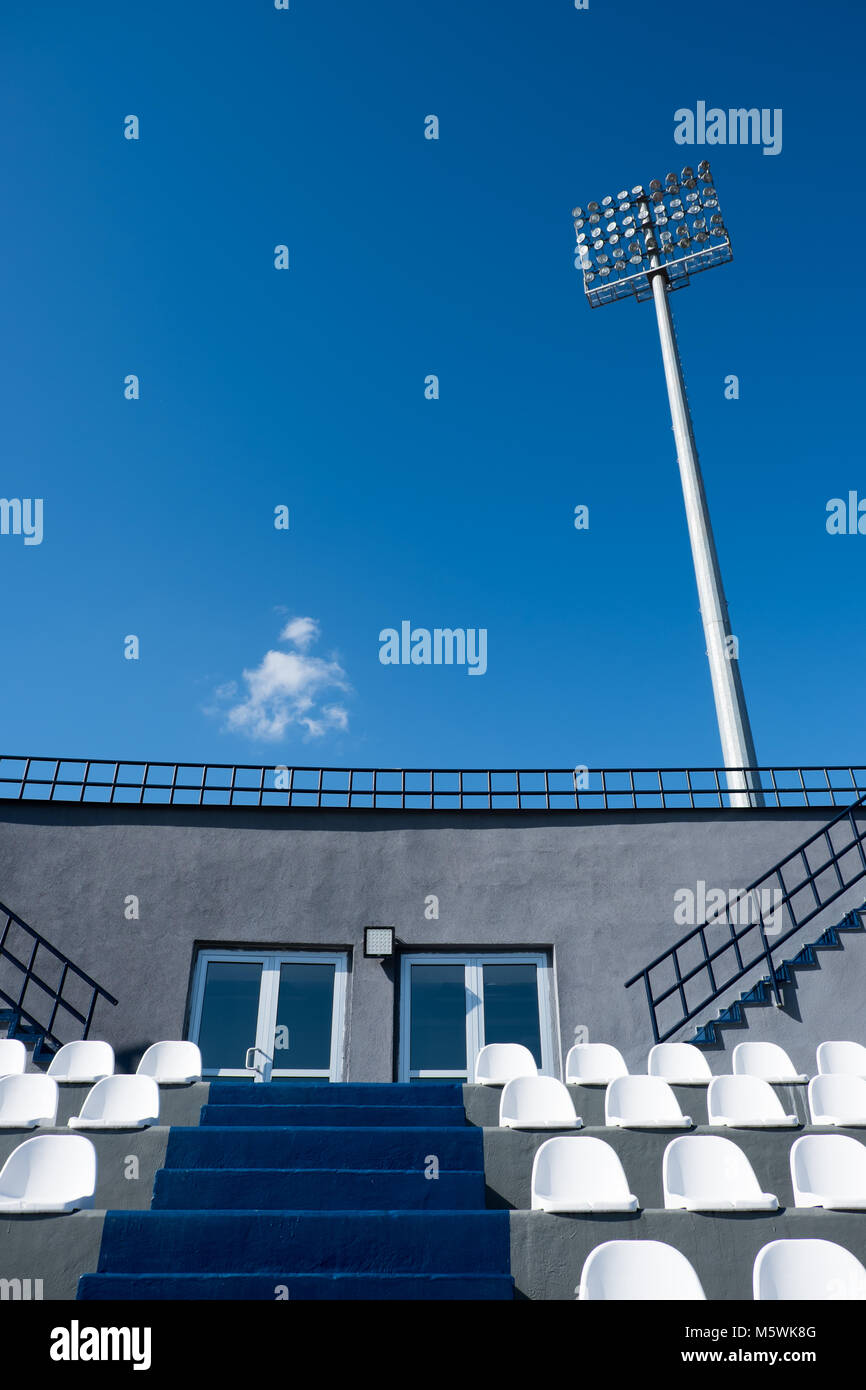 contemporary stadium seat light and tracks Stock Photo - Alamy