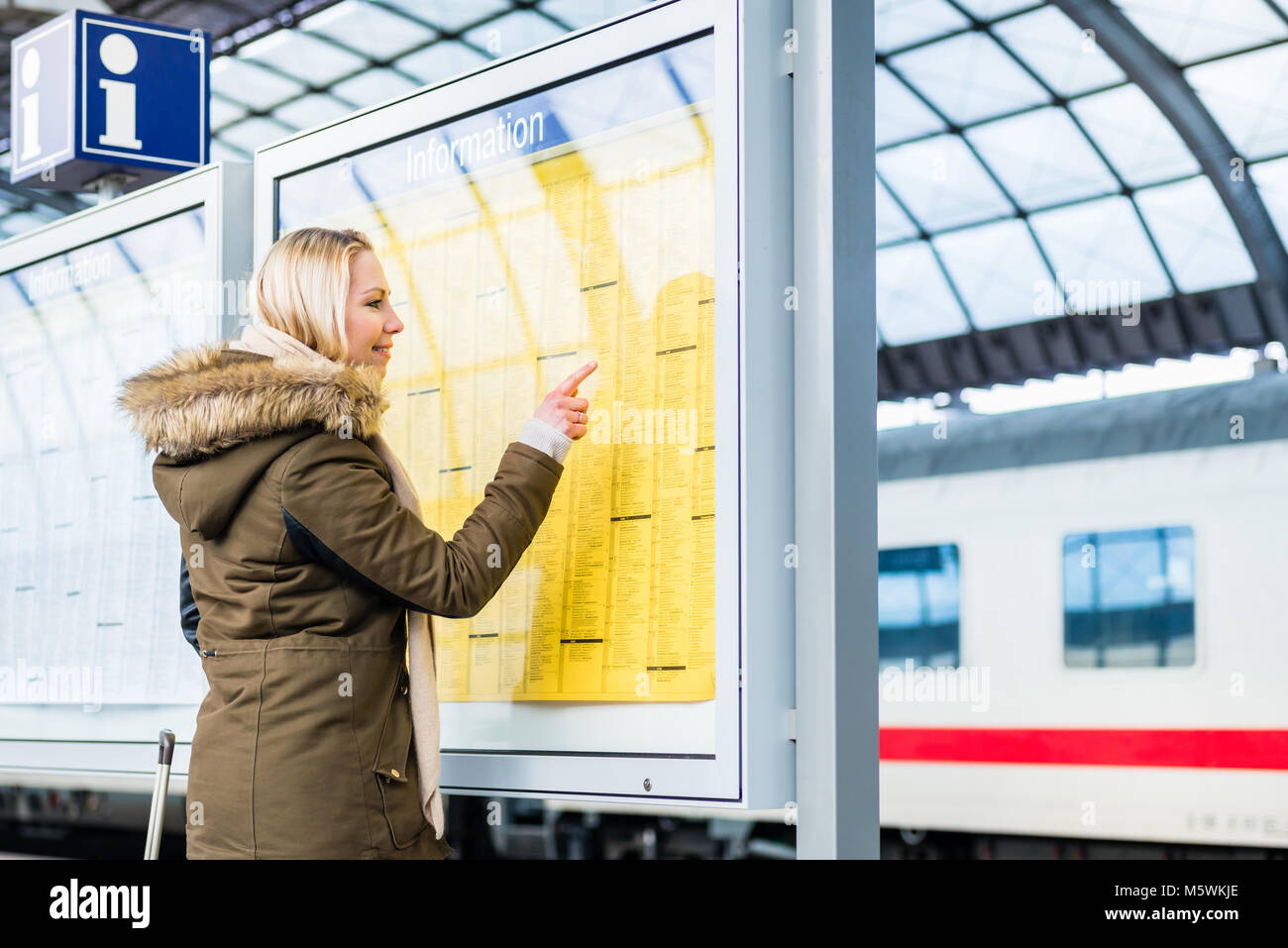Train station timetable hi-res stock photography and images - Alamy
