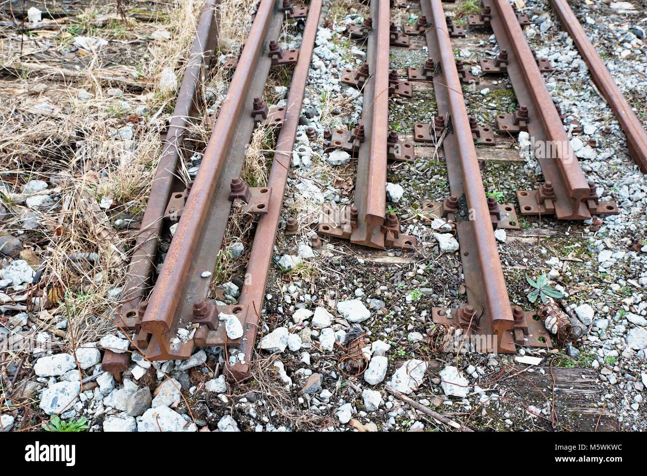 Railway rails scrap. Recycling industry. Metal material is waiting for ...