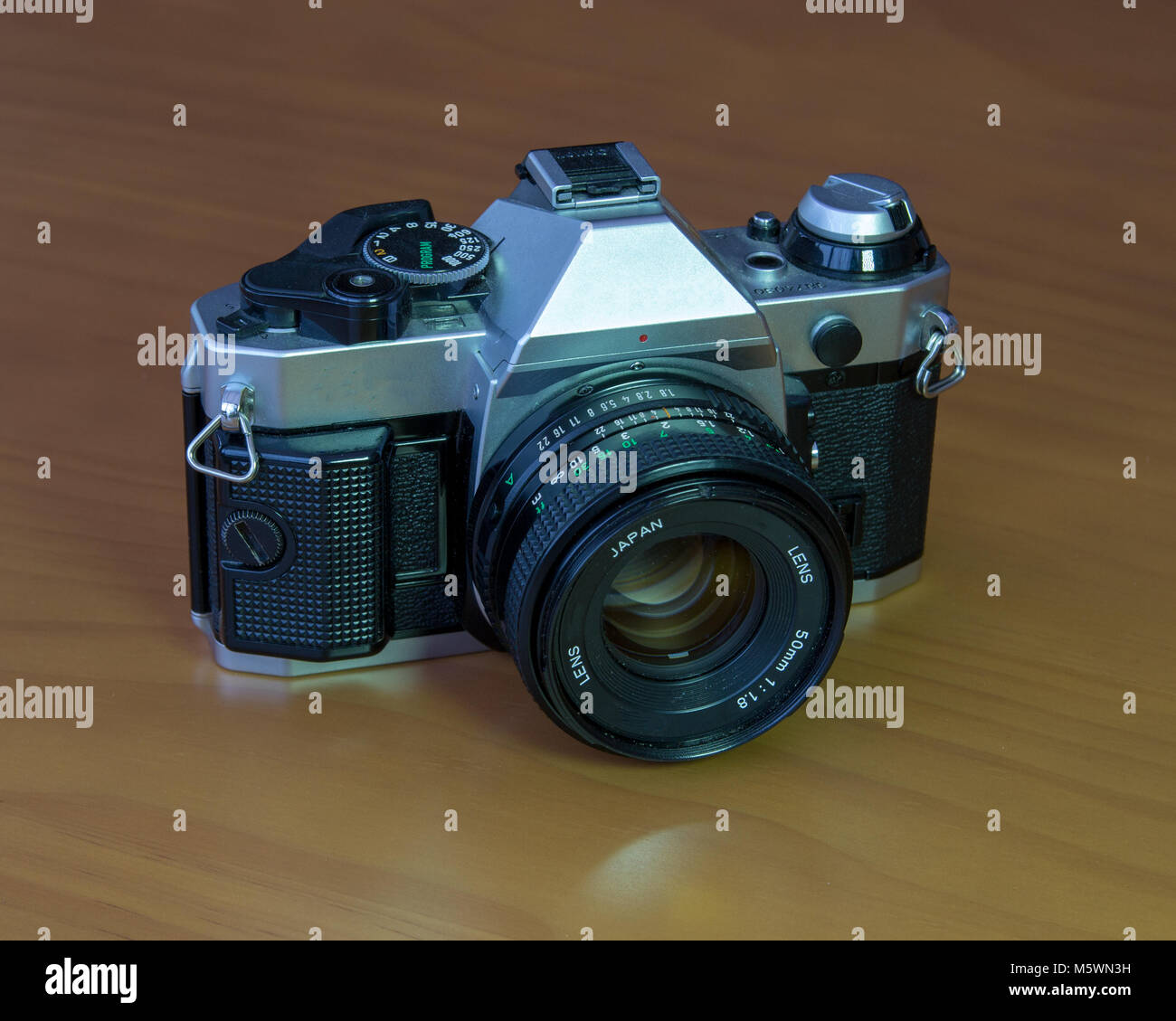 Retro film camera and film Stock Photo - Alamy