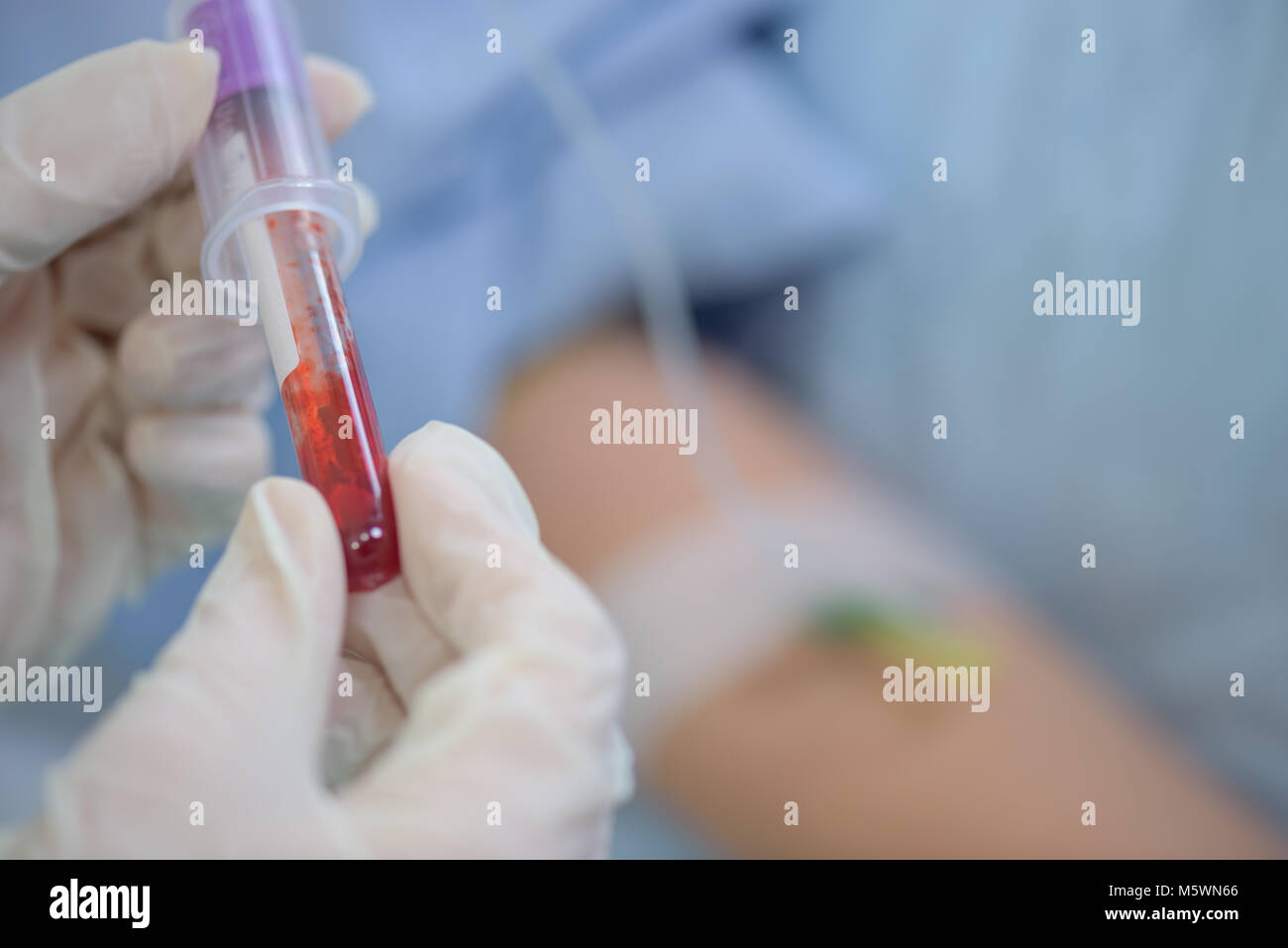 Close up of vial of blood Stock Photo - Alamy