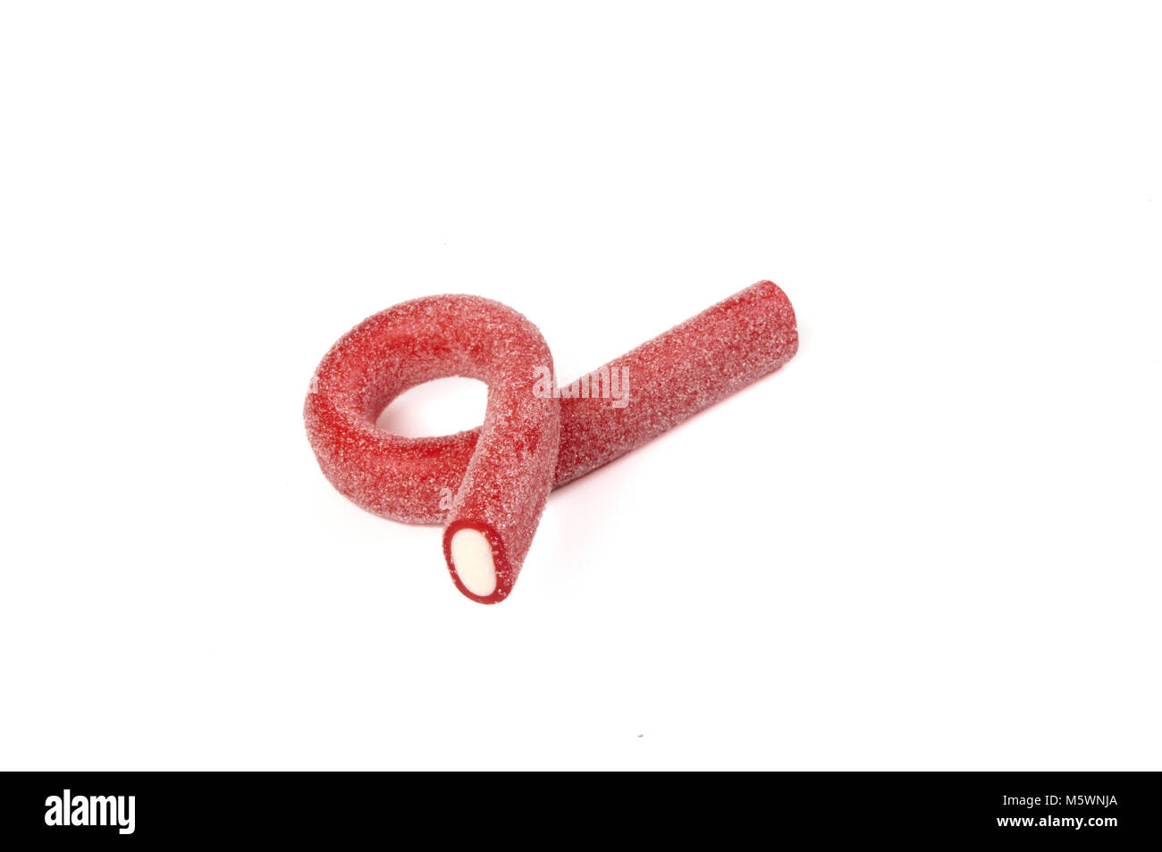 one licorice red candy on white Stock Photo - Alamy