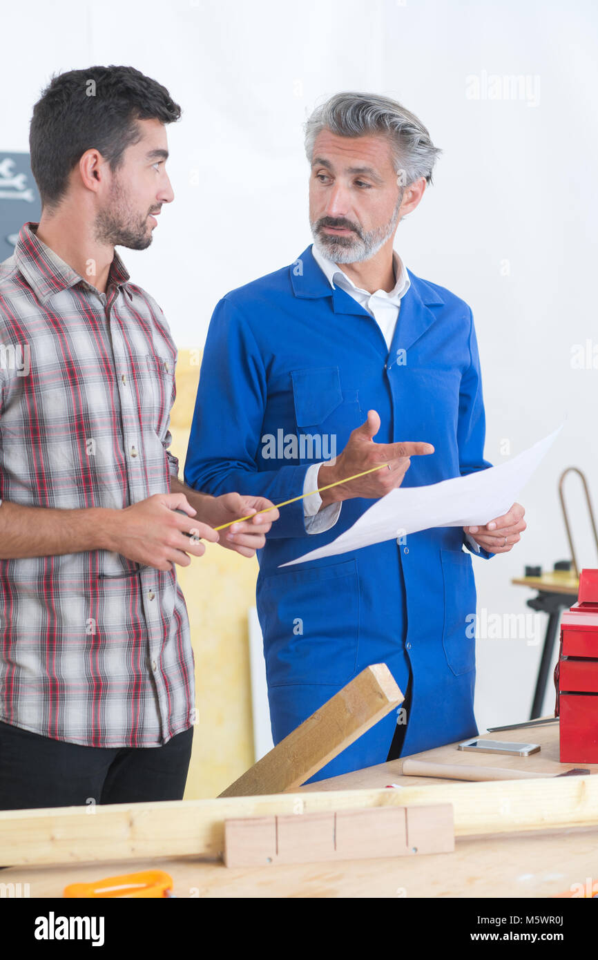 carpentry apprentice and his mentor Stock Photo - Alamy