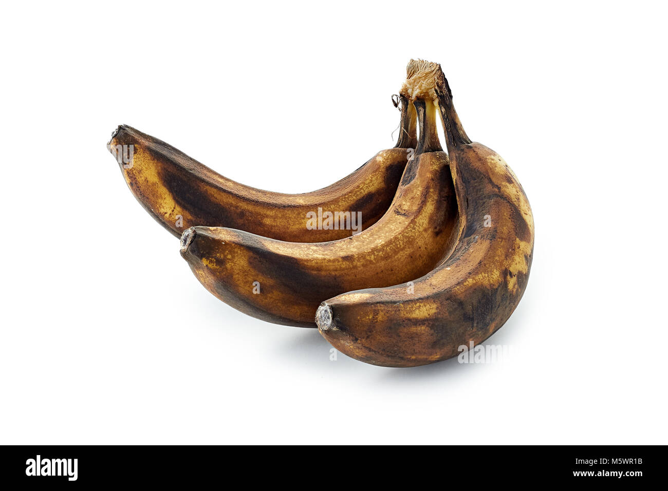 spoiled banana isolated on white background Stock Photo - Alamy