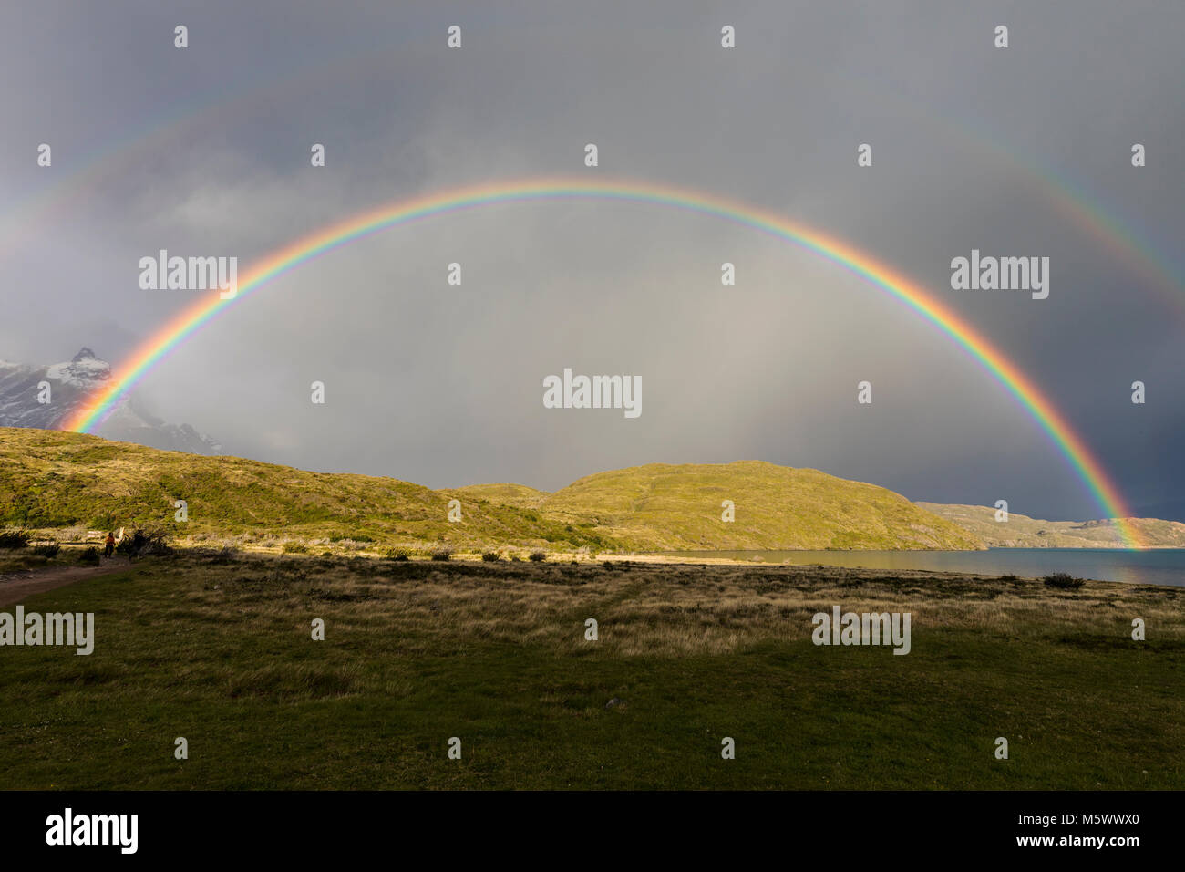 Spectacular rainbow over Lago Grey; Refugio Grey; Torres del Paine ...