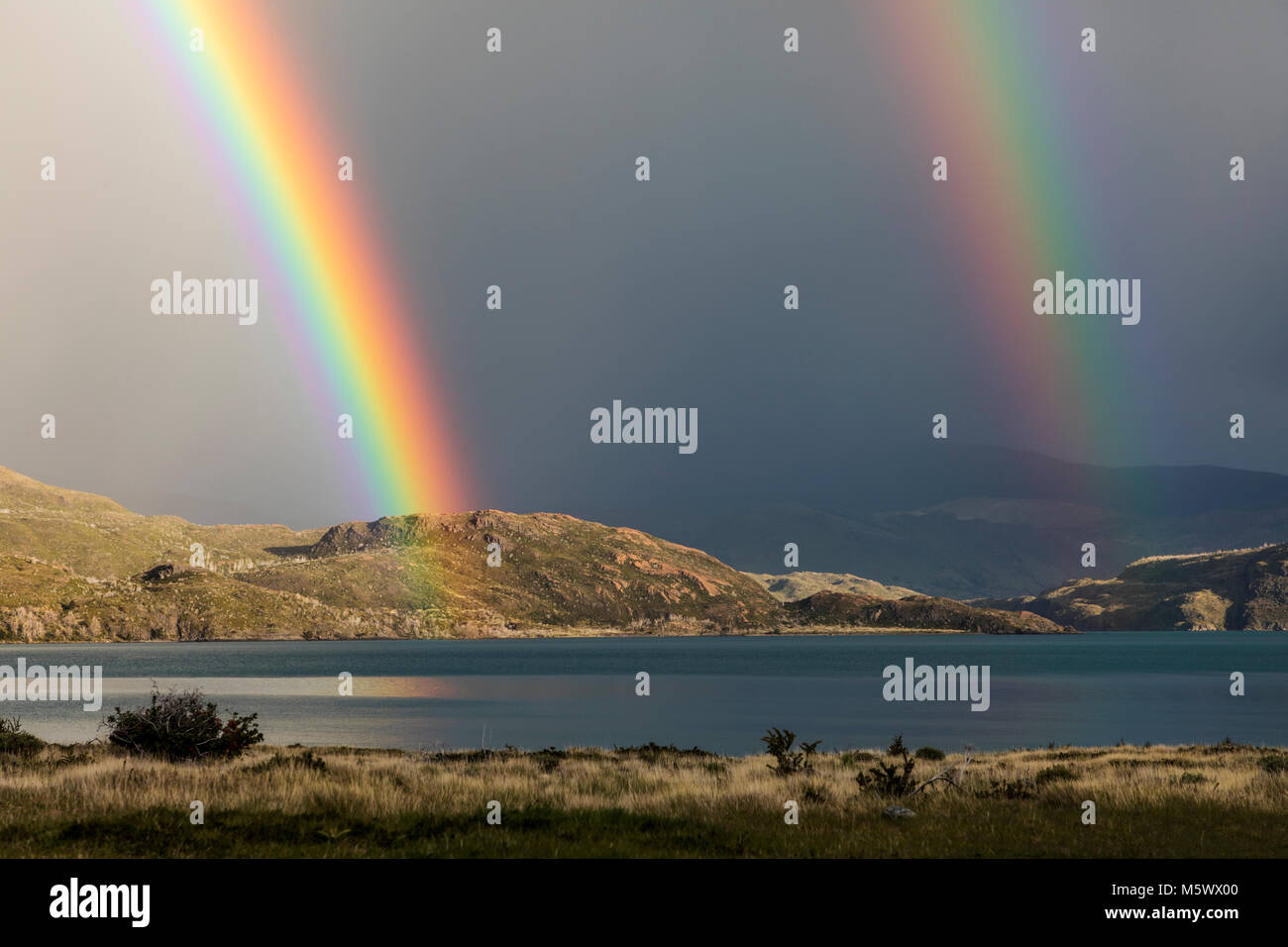 Spectacular rainbow over Lago Grey; Refugio Grey; Torres del Paine ...