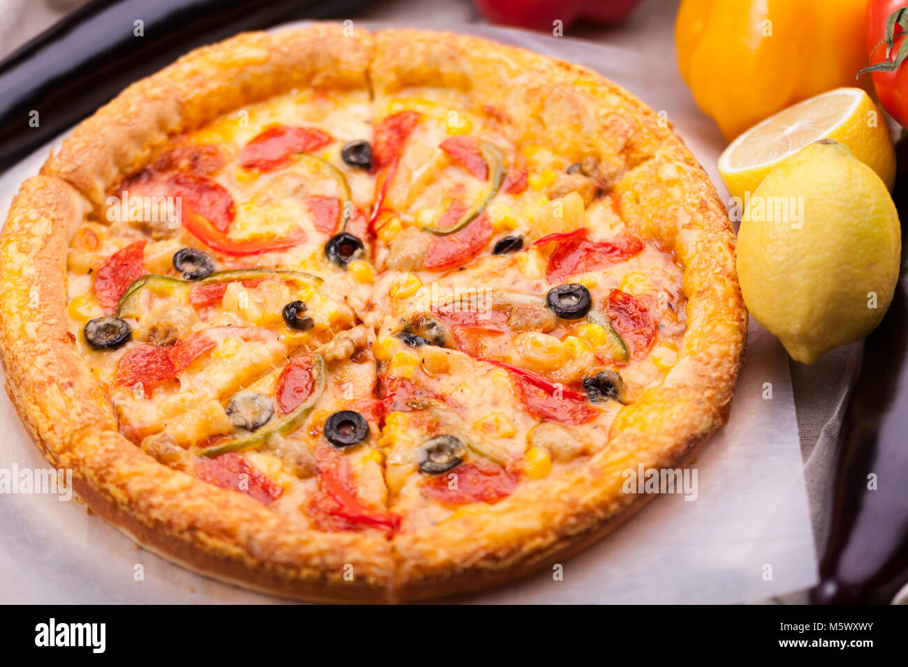 Pizza on the white table Stock Photo - Alamy