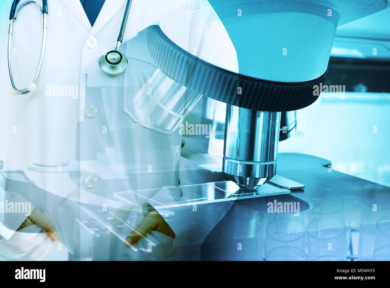 Doctor with microscope, medical research in laboratory Stock Photo - Alamy