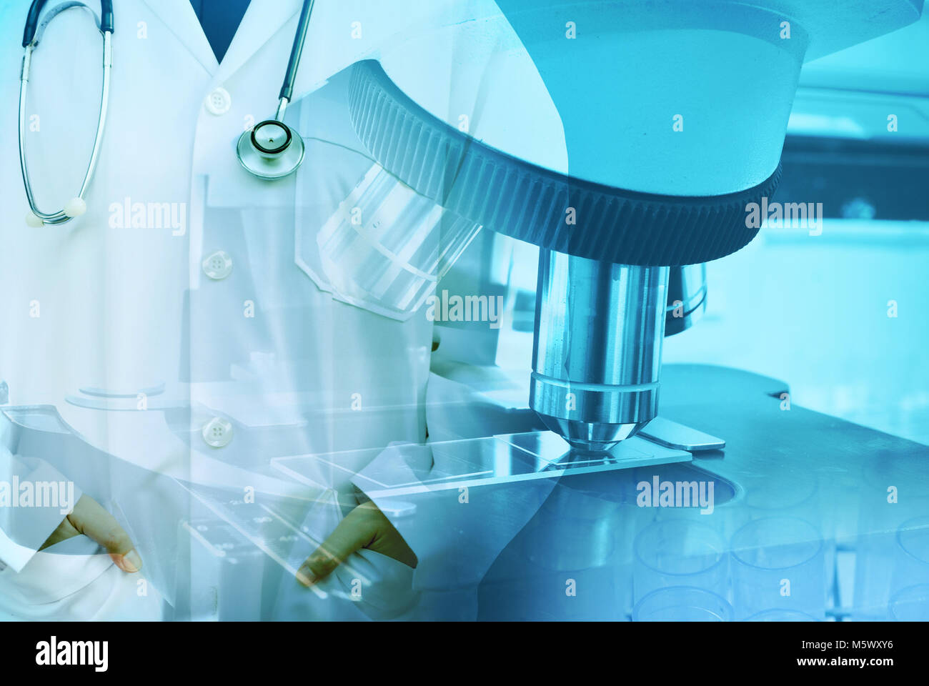Doctor with microscope, medical research in laboratory Stock Photo - Alamy
