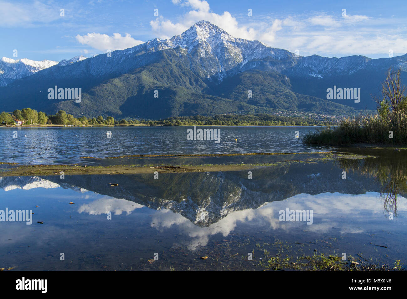 reflection of the Italian Alps in the Como lake Stock Photo - Alamy