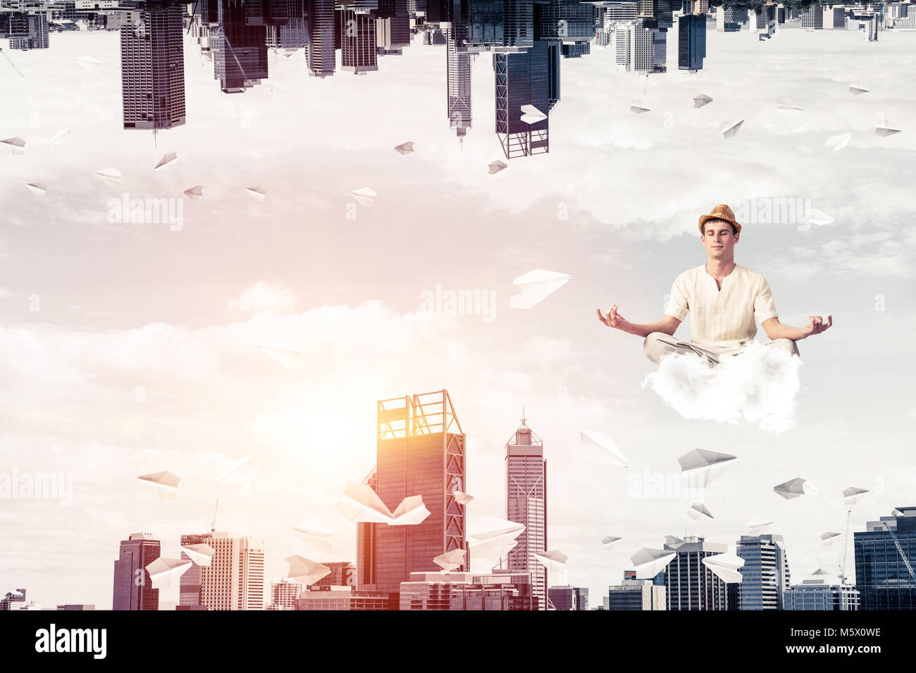 Young man keeping mind conscious Stock Photo - Alamy