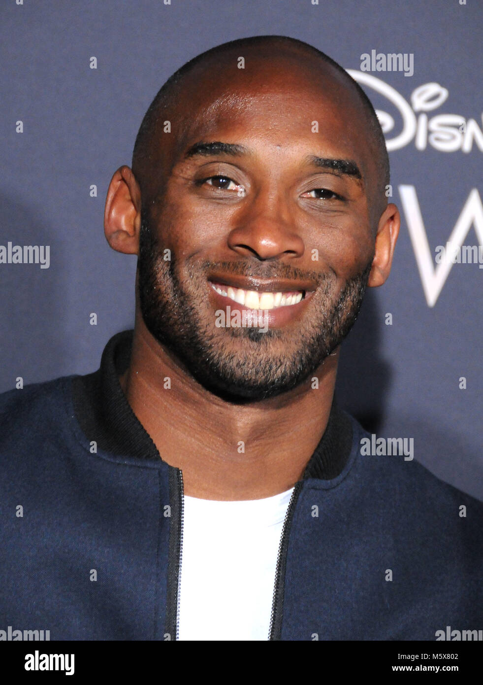 Kobe bryant in suit hi-res stock photography and images - Alamy