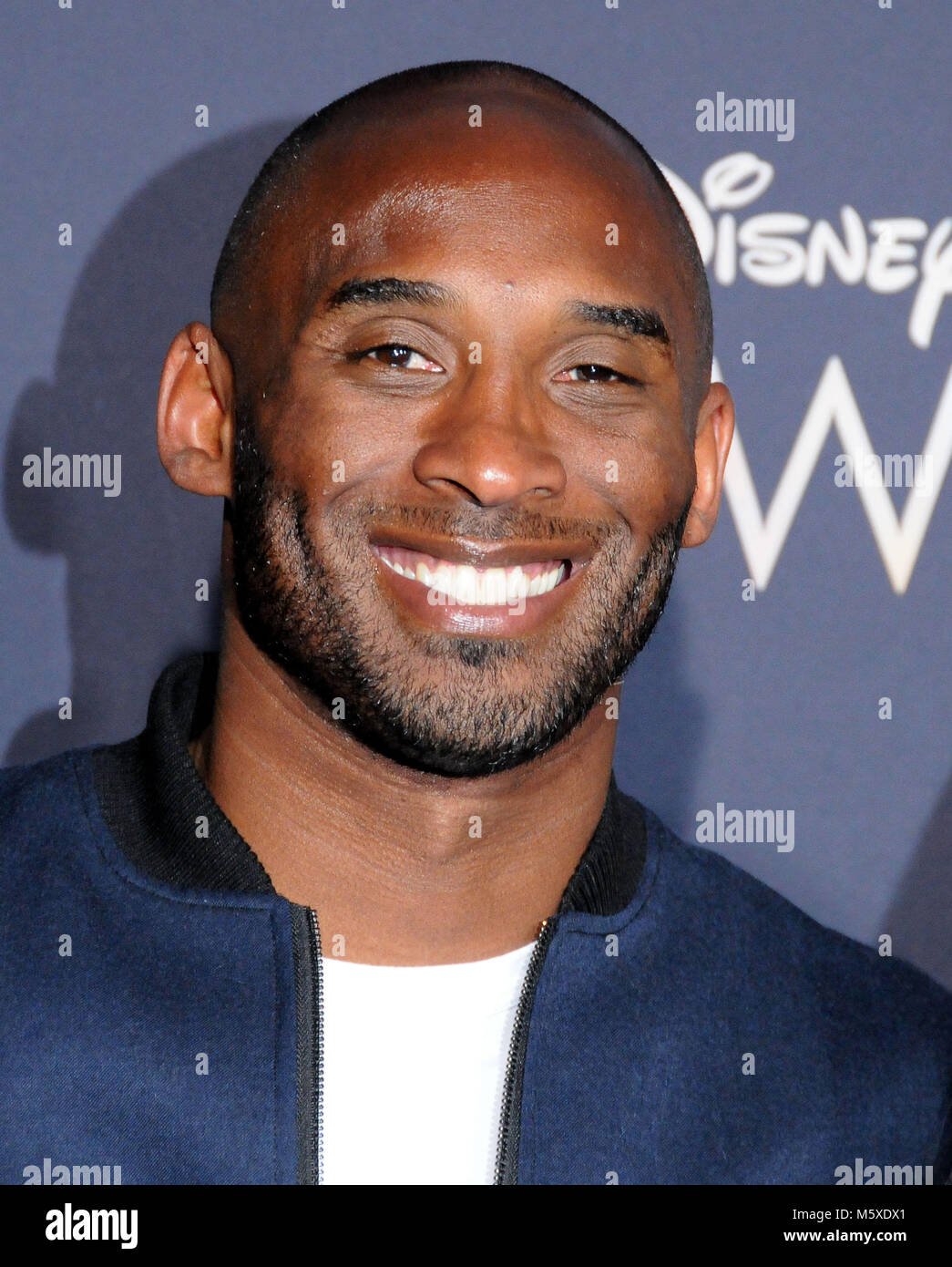 Kobe bryant in suit hi-res stock photography and images - Alamy