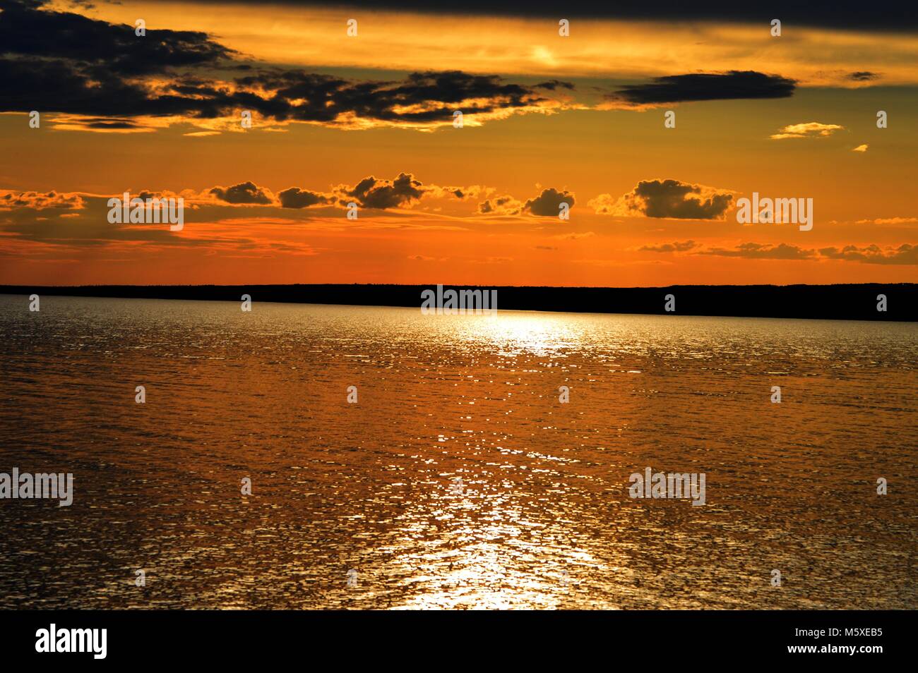 Sunset at Great Slave Lake Stock Photo - Alamy
