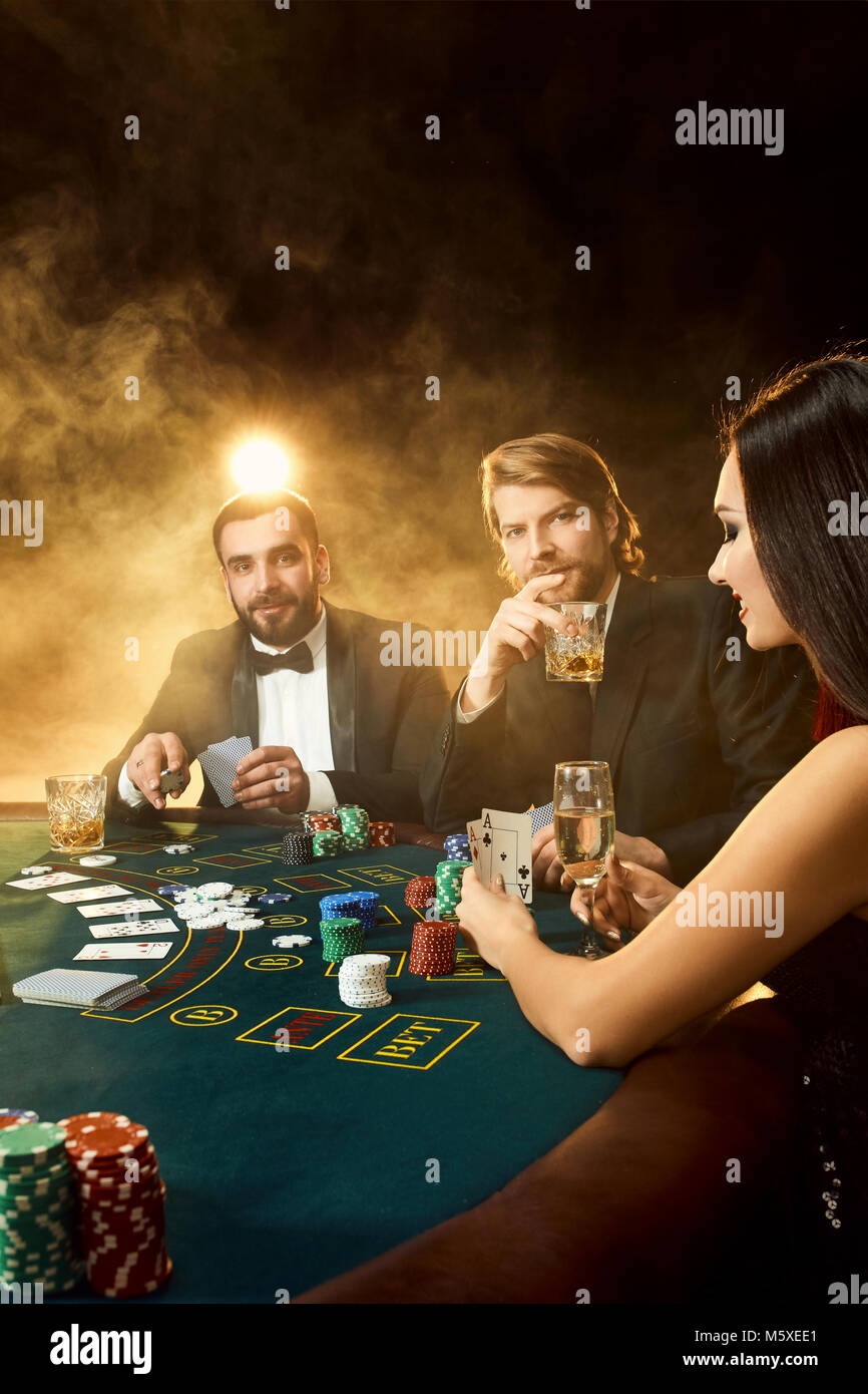 Suit men playing cards hi-res stock photography and images - Alamy