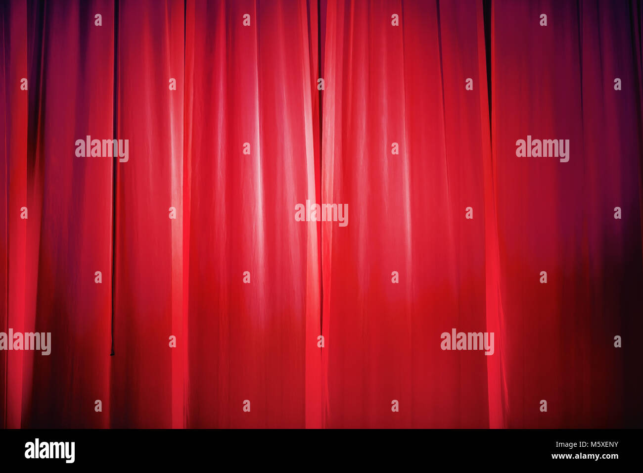 Bright red stage curtain with spotlight. Abstract background Stock ...