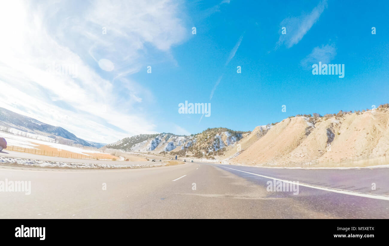 Driving through Mountain terrain in the Winter Stock Photo - Alamy