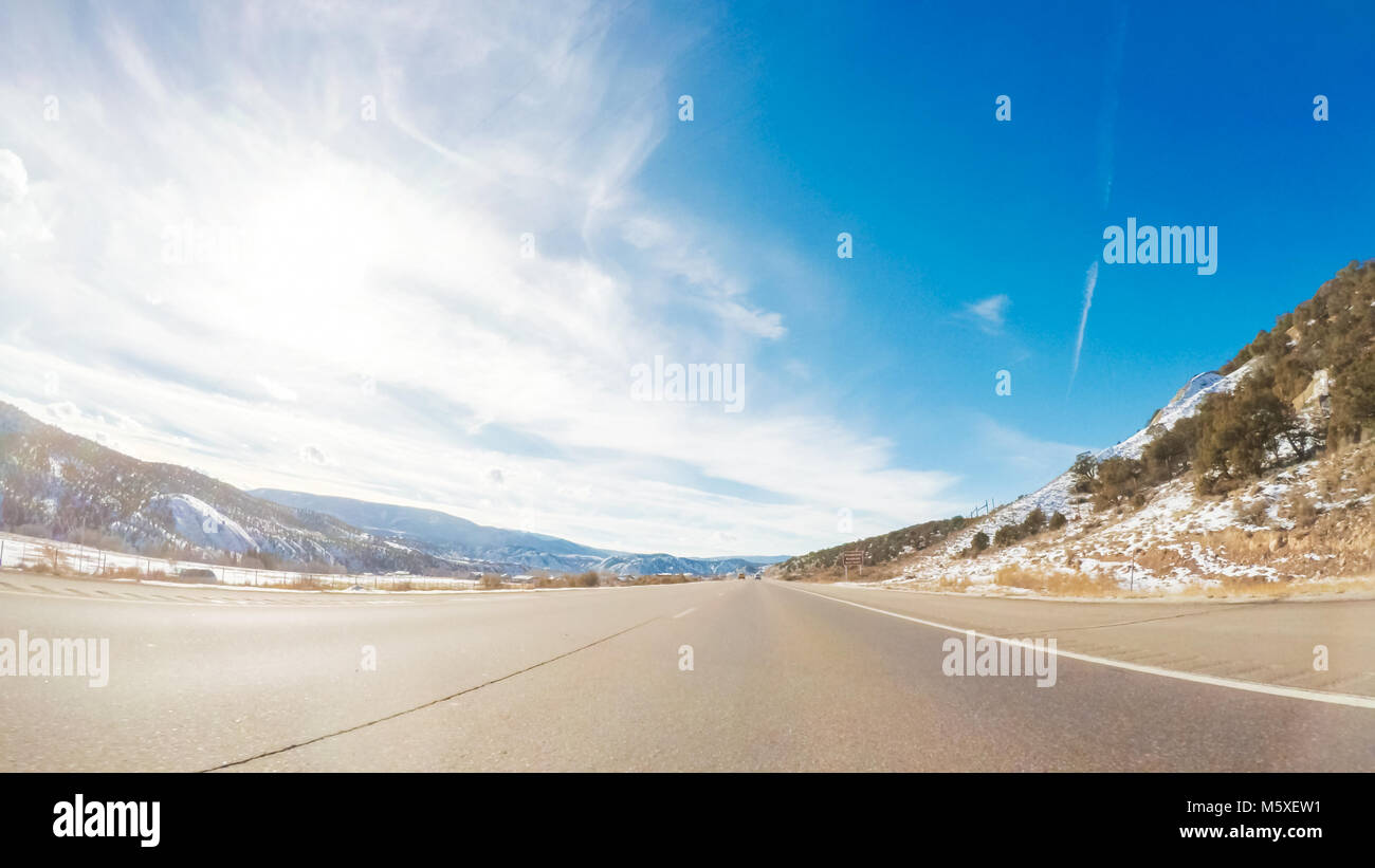 Driving through Mountain terrain in the Winter Stock Photo - Alamy