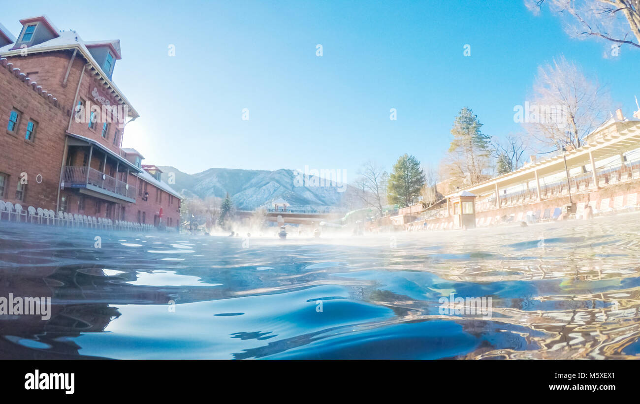 Swimming in outdoor hot springs pool in the Winter Stock Photo - Alamy
