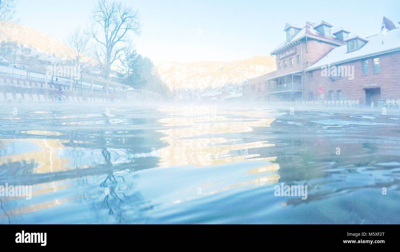 Swimming in outdoor hot springs pool in the Winter Stock Photo - Alamy