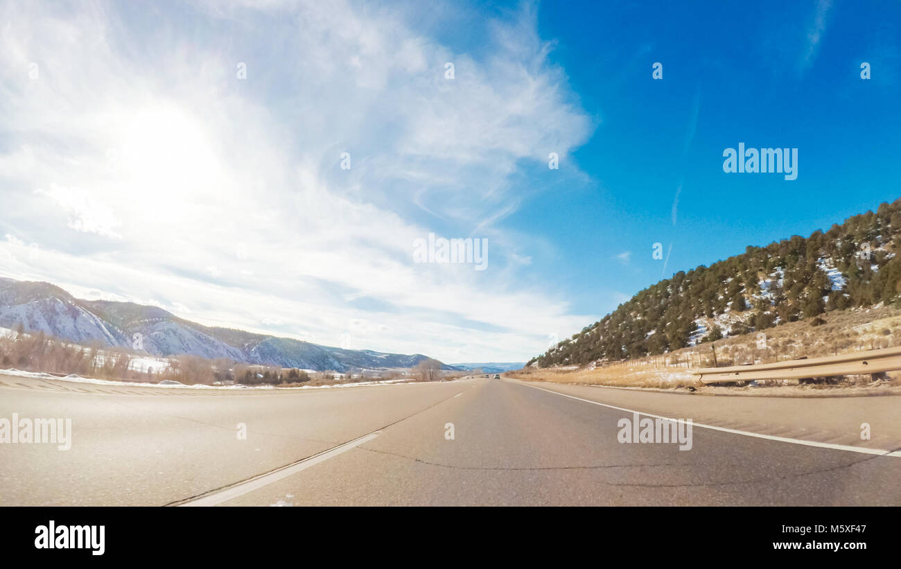 Driving through Mountain terrain in the Winter Stock Photo - Alamy