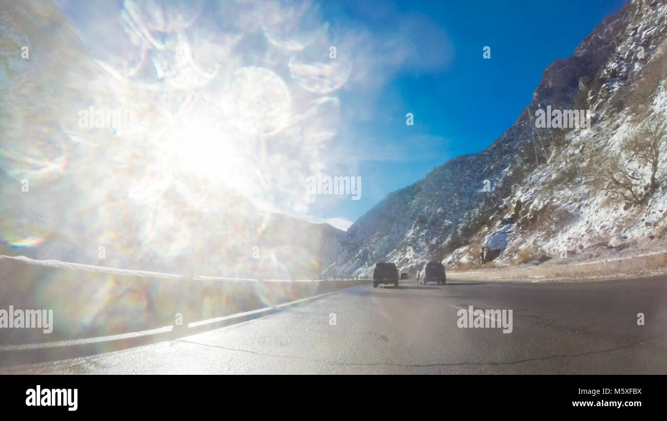Driving through Mountain terrain in the Winter Stock Photo - Alamy