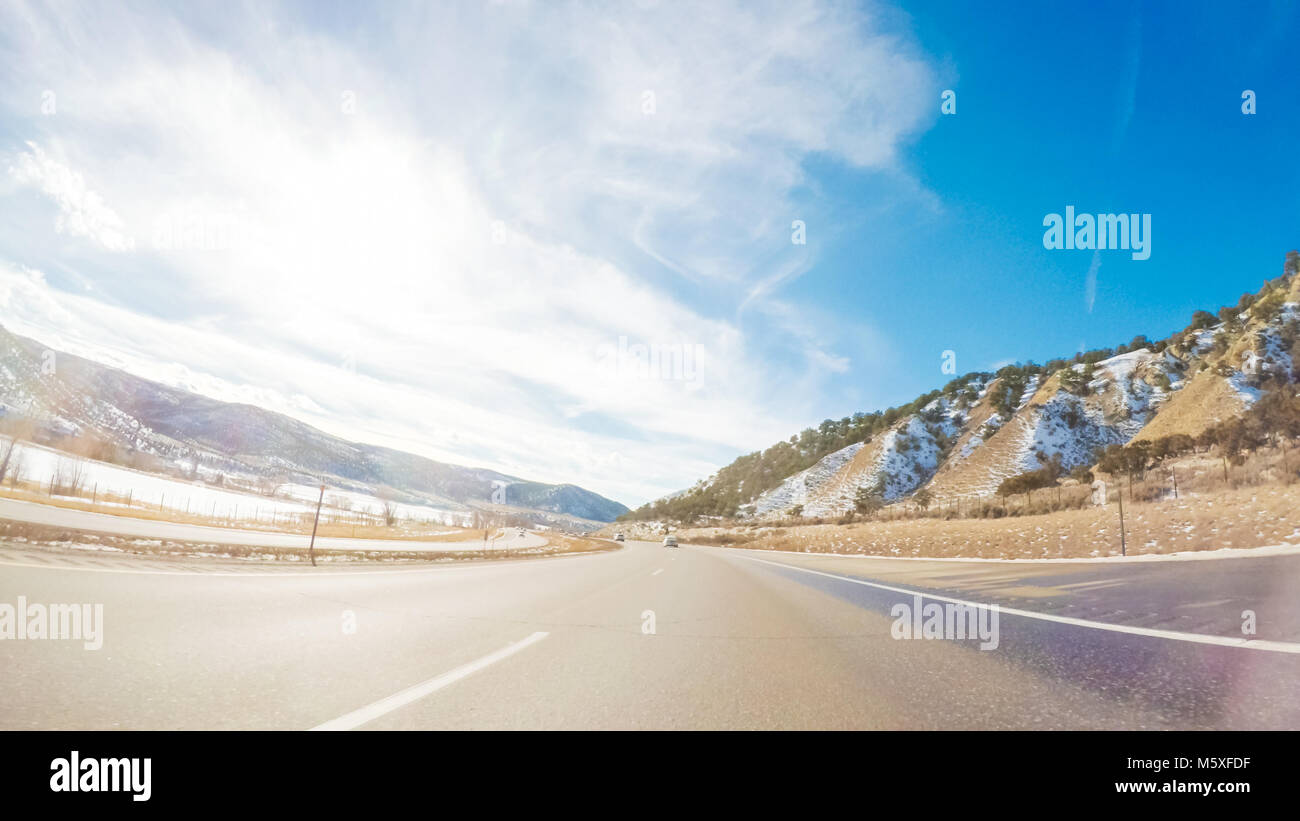 Driving through Mountain terrain in the Winter Stock Photo - Alamy