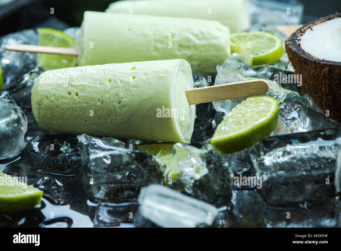 Green avocado popsicles ice cream Stock Photo - Alamy