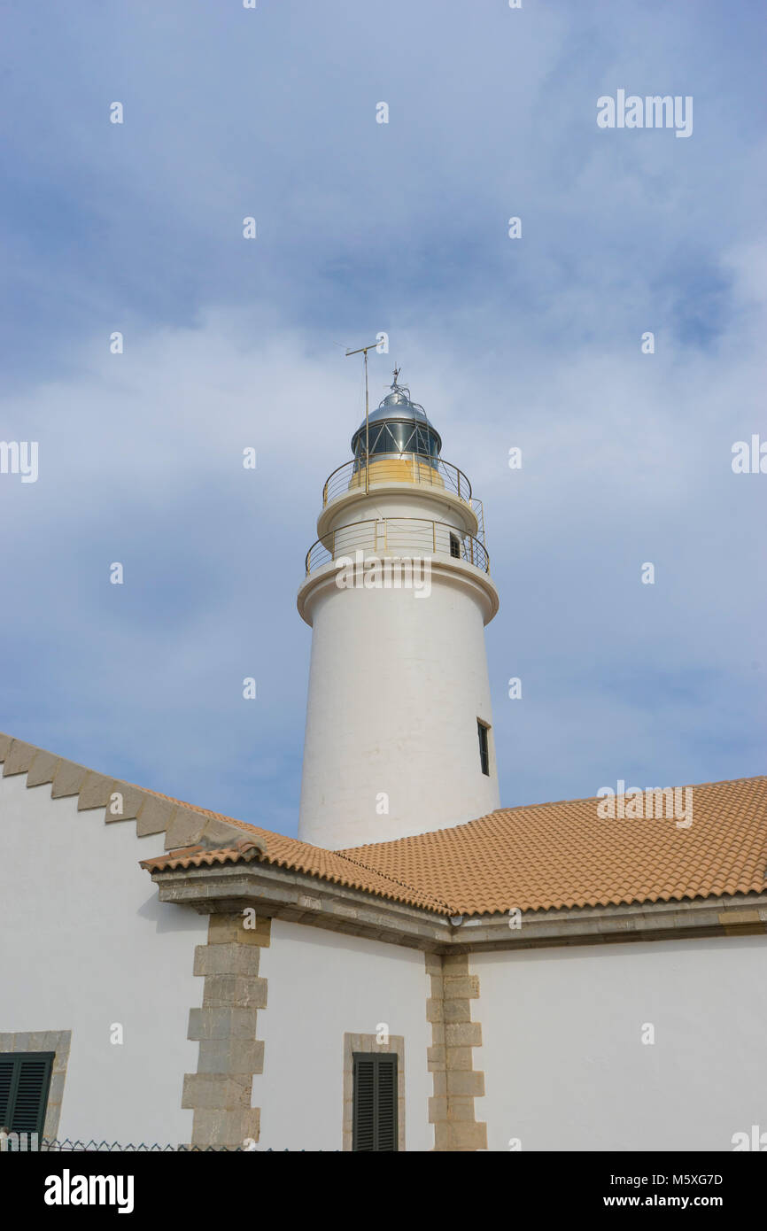 lighthouse next to the Mediterranean Sea, blue sky without clouds with ...