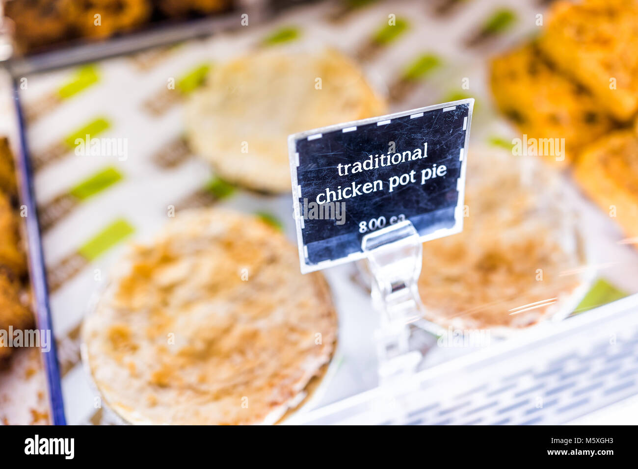 Traditional chicken pot pie sign, price on display on market counter in ...