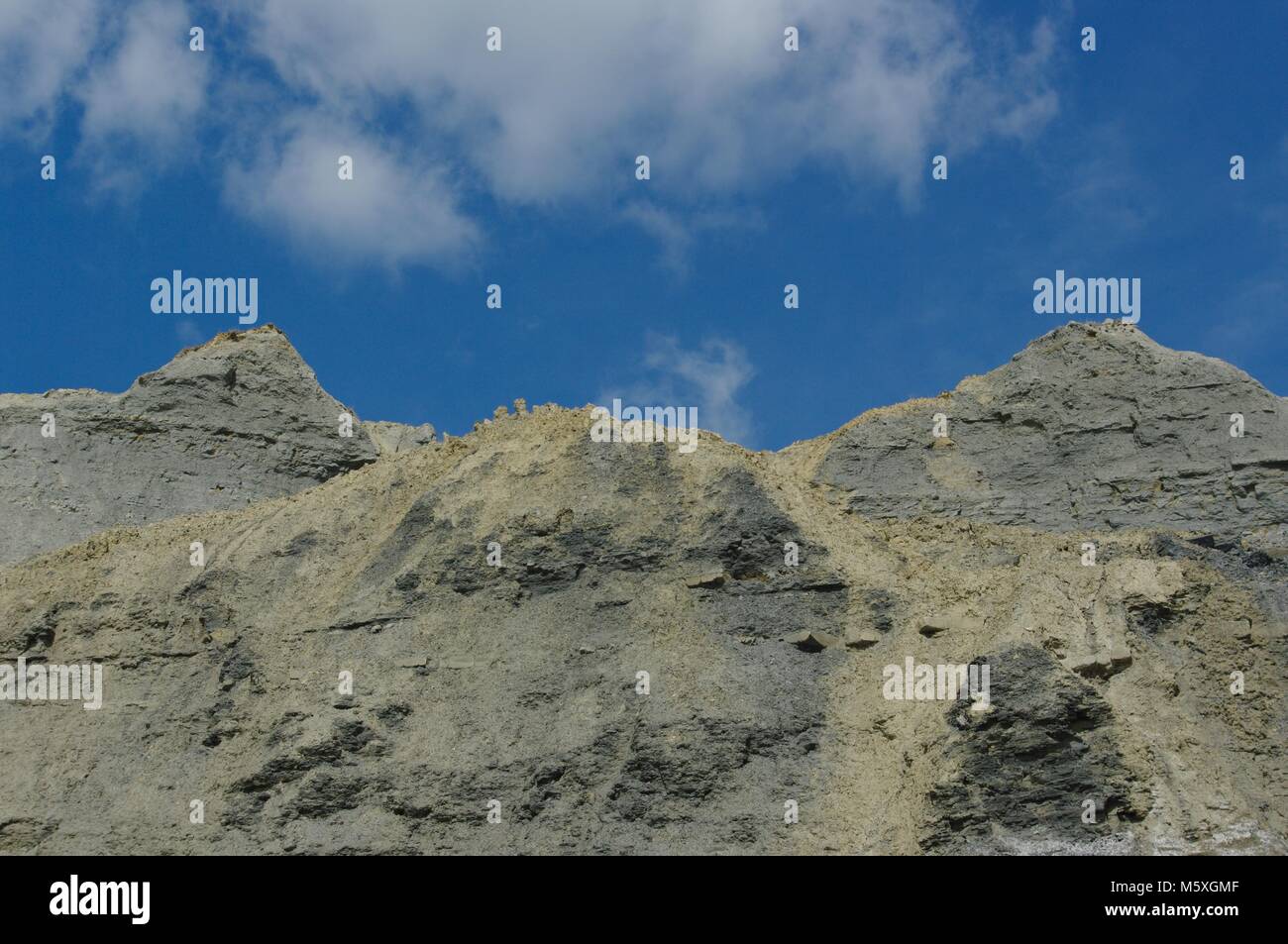 Soft Grey Fossil Rich Mudstone Cliffs Along Charmouth Beach, West ...