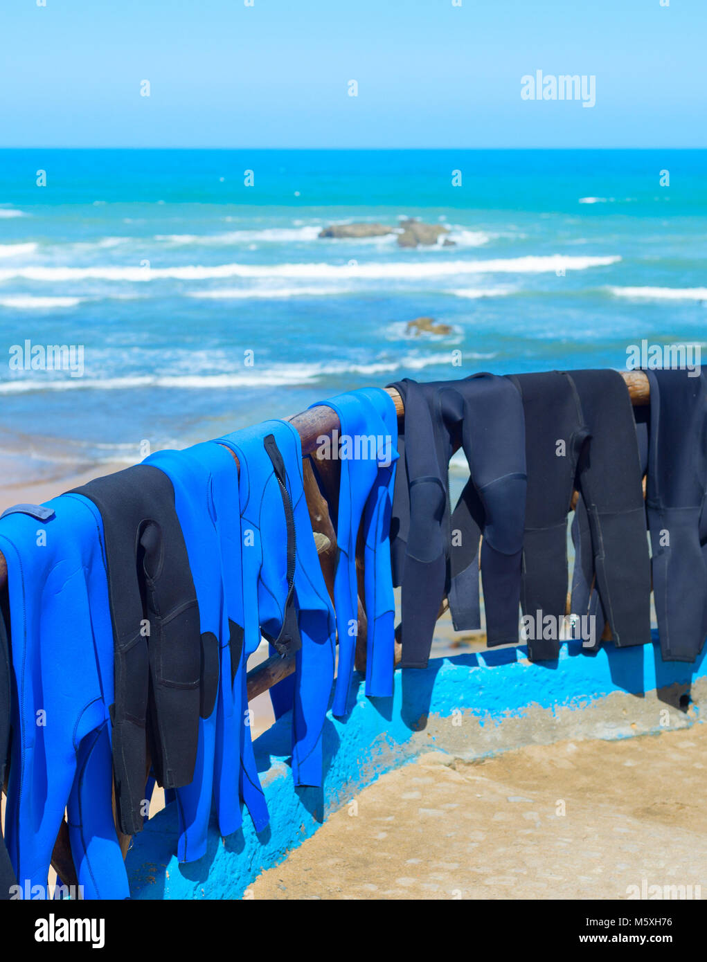 Wetsuit drying hi-res stock photography and images - Alamy